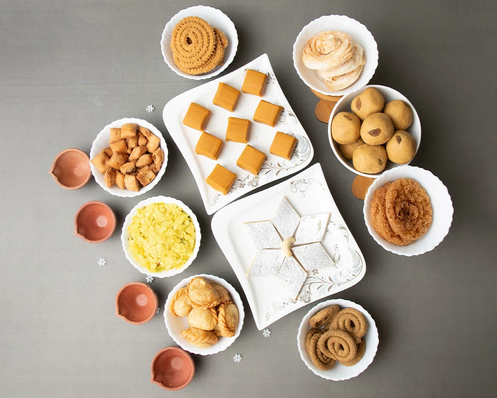 Buy Maharashtrian Diwali Faral Hamper. 5 sweets, 6 snacks, lantern